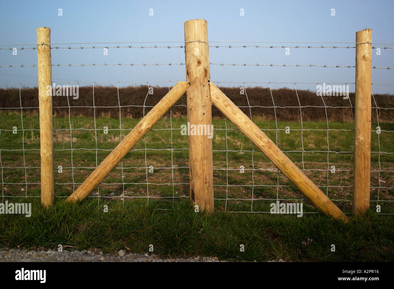 New fencing and wooden posts for cycle track on former railway track ...
