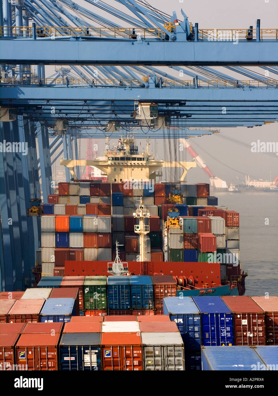 Container vessel at container terminal. Cargo operations in progress ...