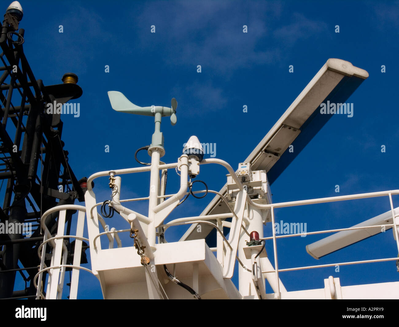 Top of ship main mast with radar scanner and weather station vane Stock ...