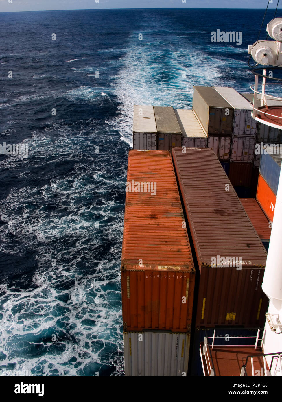 Wash behind container vessel at sea Stock Photo - Alamy