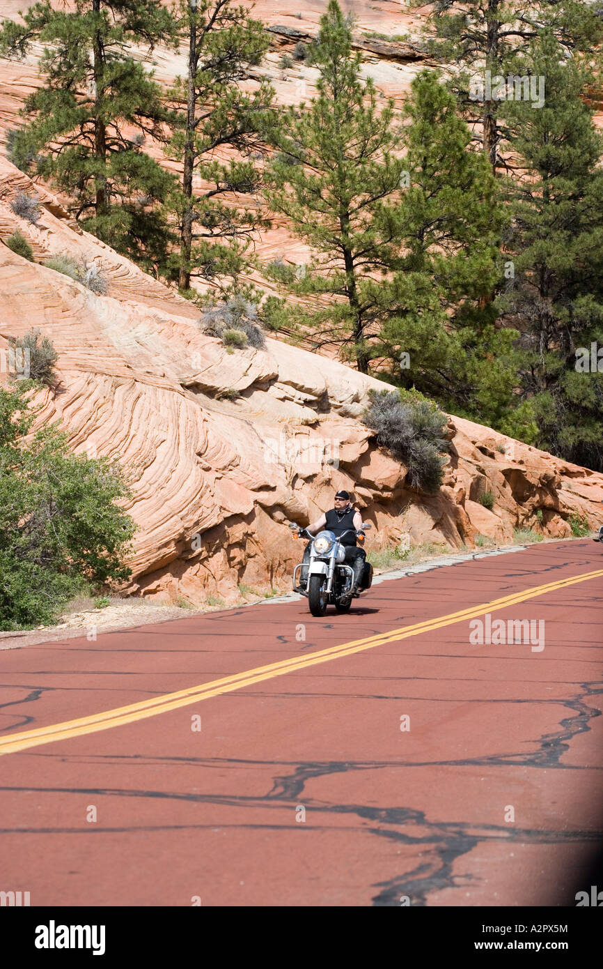 Biker Riding through Canyonlands National Park Utah Stock Photo - Alamy