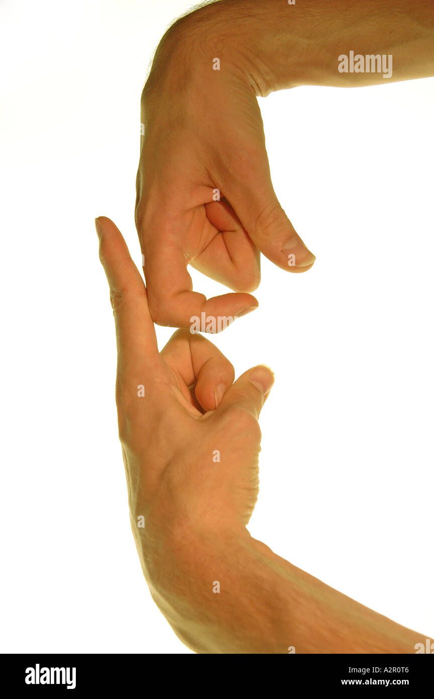 Young caucasian man's hands demonstrating the British sign for the ...