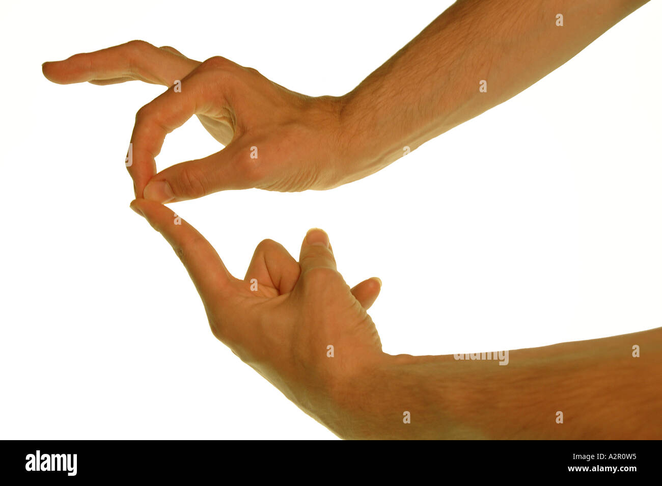 Young caucasian man's hands demonstrating the British sign for the ...