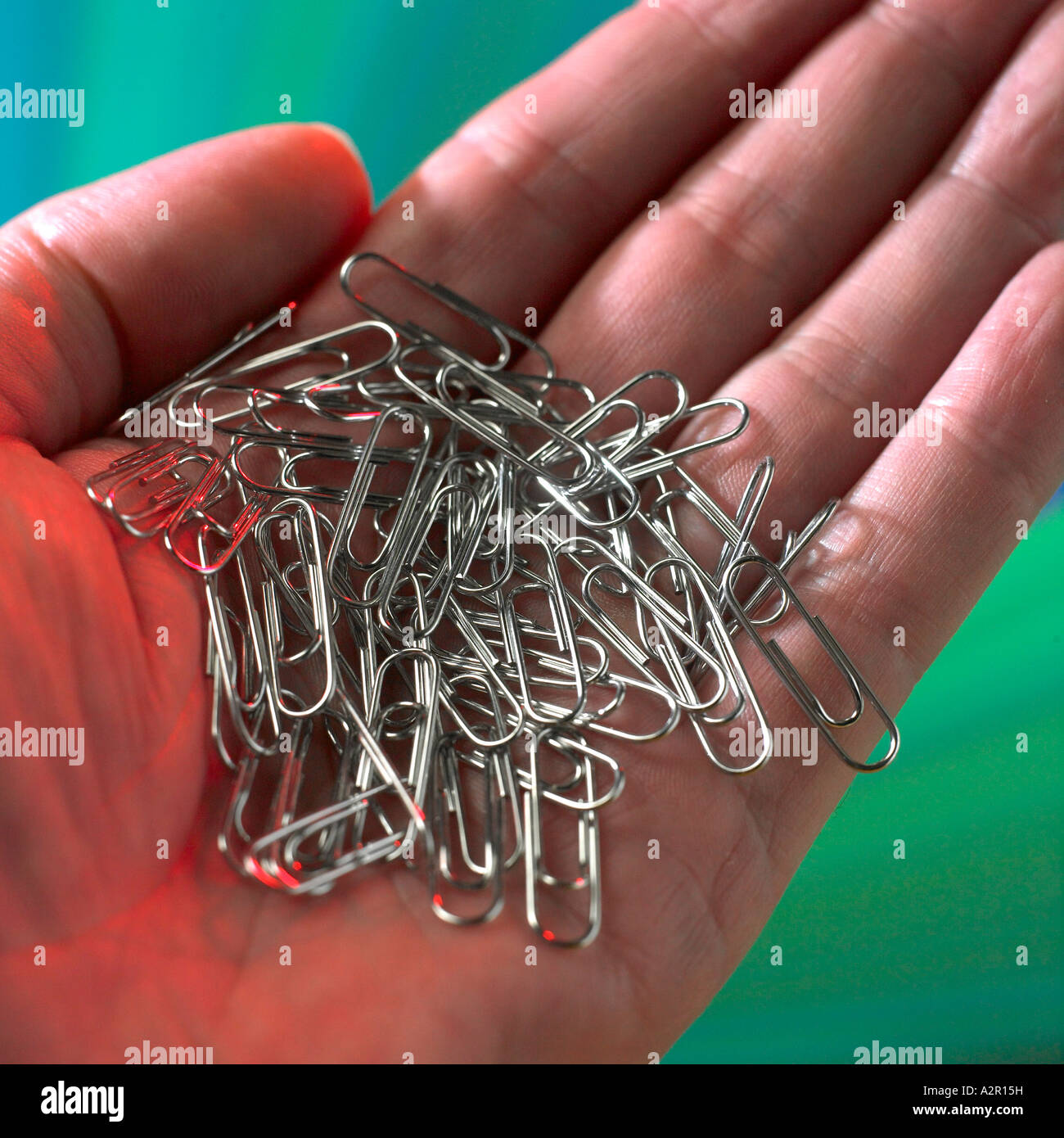 Silver paperclips hi-res stock photography and images - Alamy