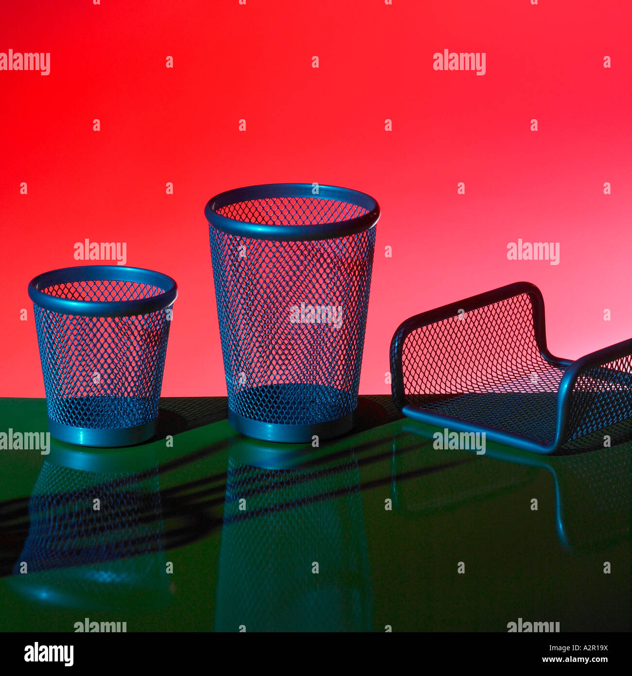 Mesh Desk Tidy Set on Green Background with Red Stock Photo - Alamy