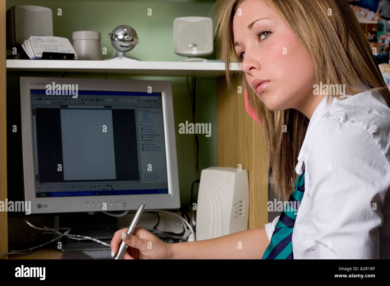 Teen in School Uniform Stressed with Revision Stock Photo - Alamy