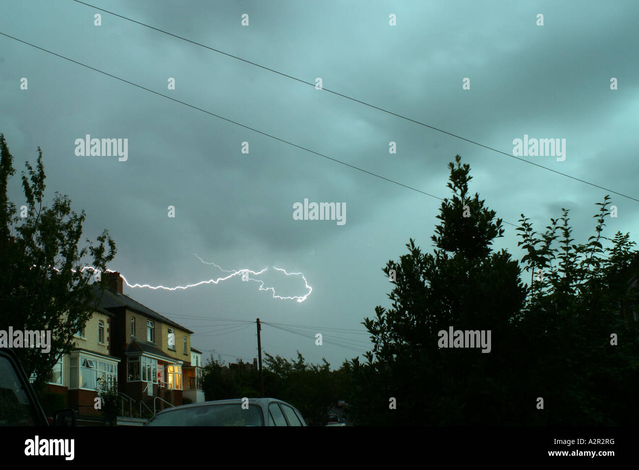 Lightning bolt over a house Stock Photo - Alamy