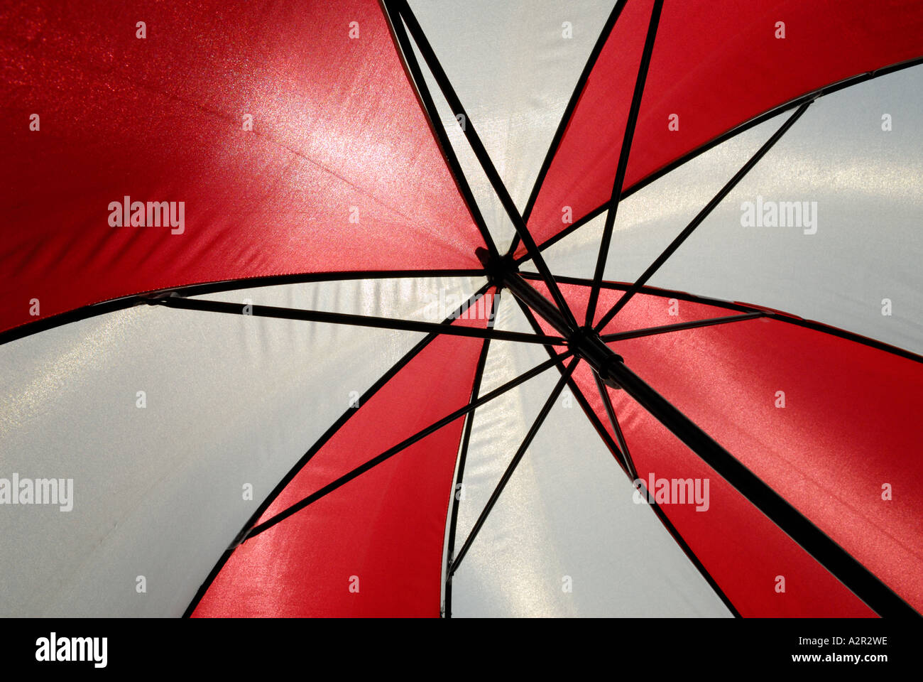 Red and white open umbrella abstract Stock Photo - Alamy