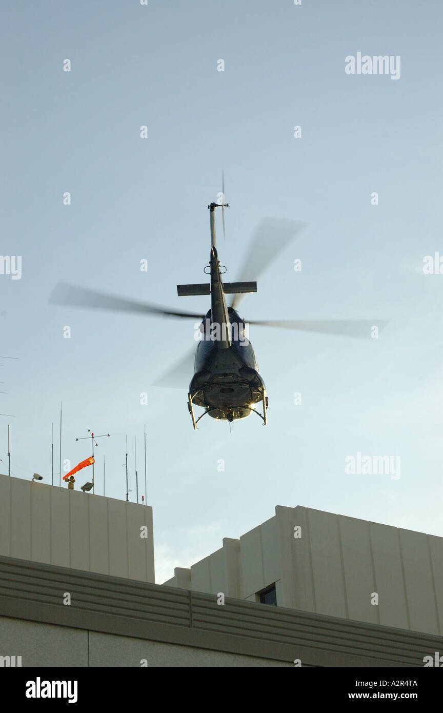 Helicopter landing on a roof Stock Photo - Alamy