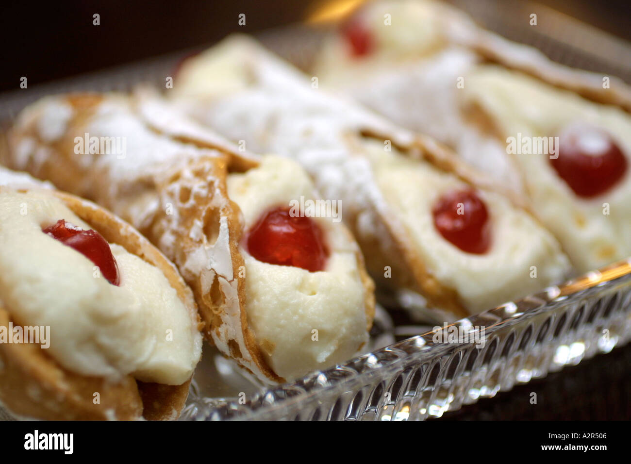 Dessert cannoli with cream and cherries Stock Photo - Alamy