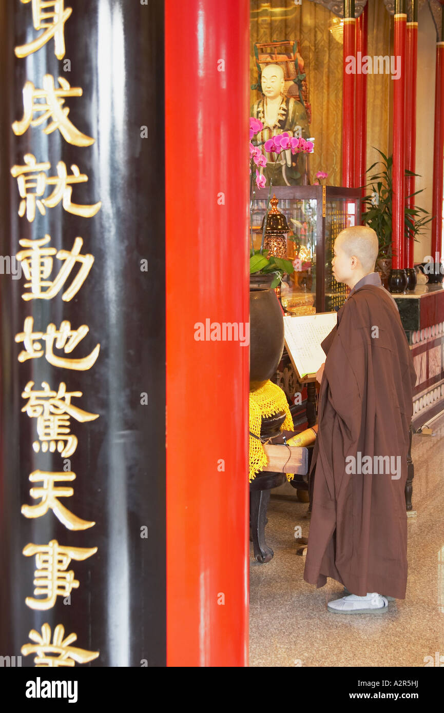 Chinese lady praying shrine hi-res stock photography and images - Alamy