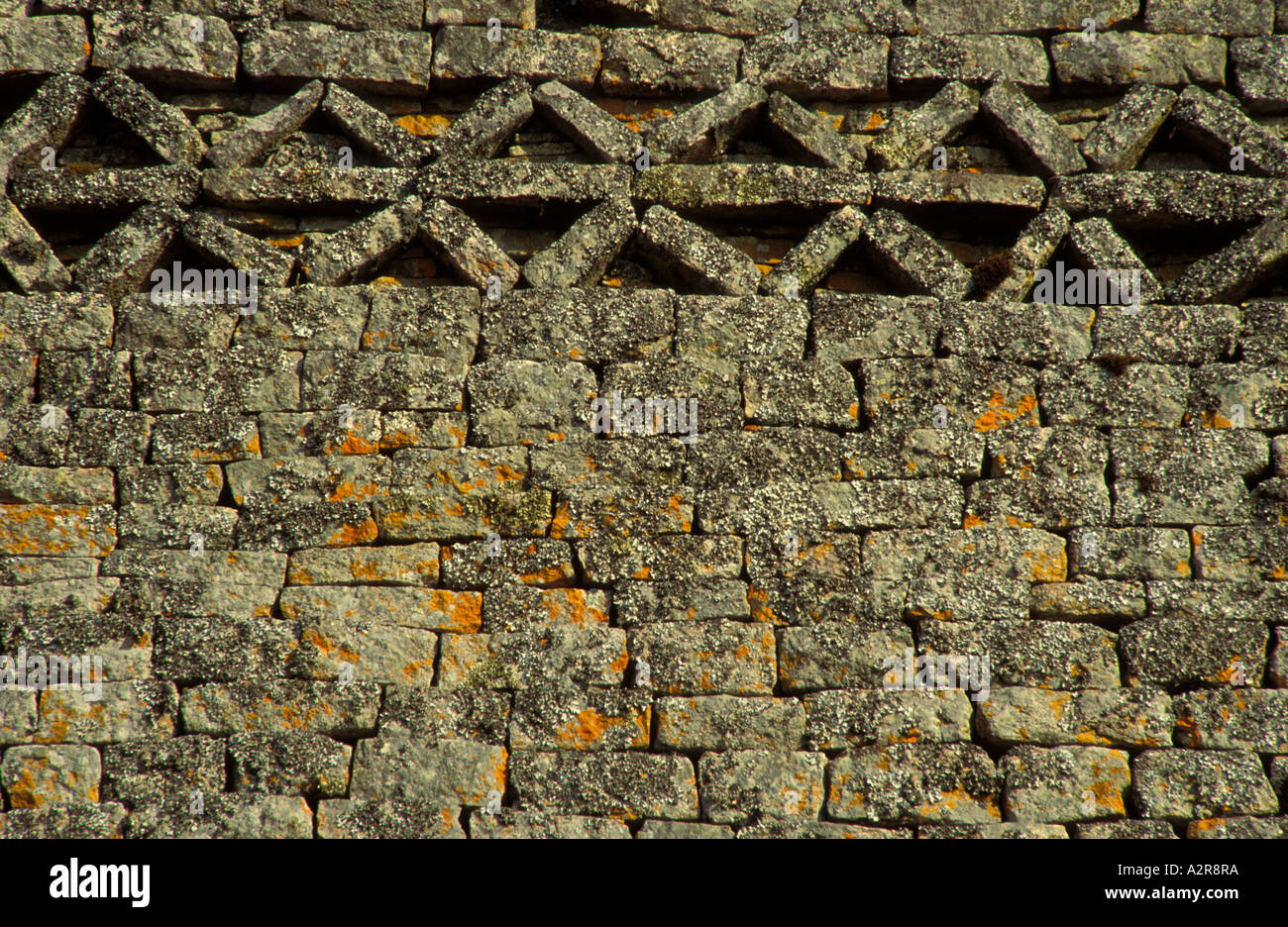 Detail showing herringbone or chevron pattern at top of outer wall of ...