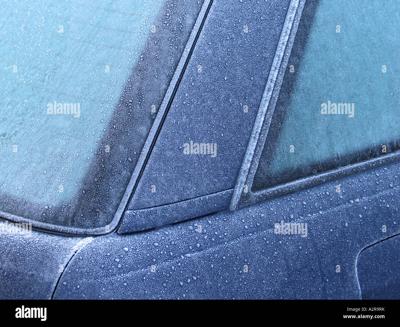 Rear car windows covered in a hard frost Stock Photo - Alamy