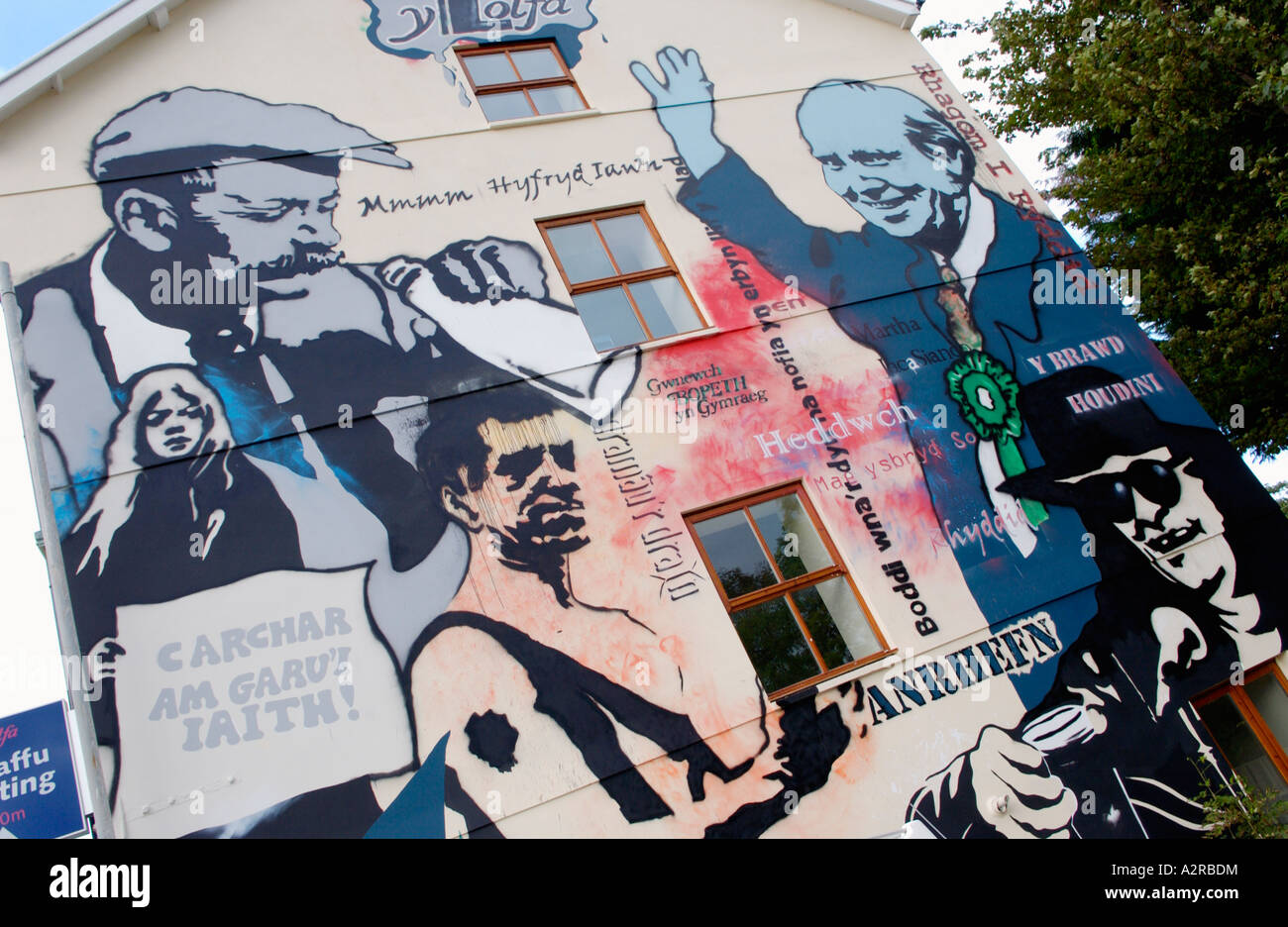 Radical Welsh political mural painted on end of buliding in Talybont ...