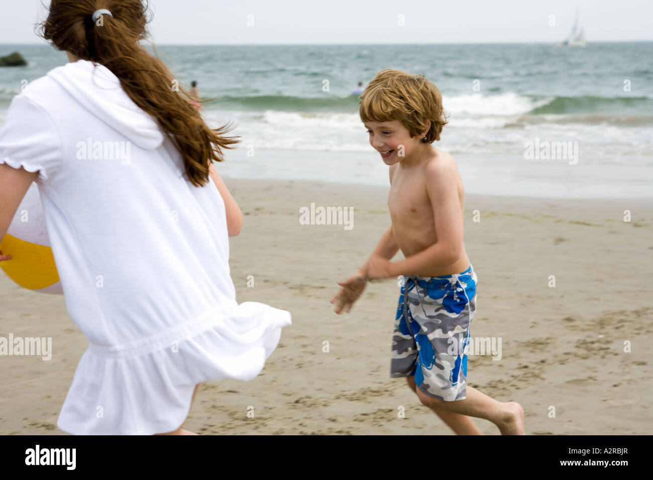 Boy chases girl hi-res stock photography and images - Alamy