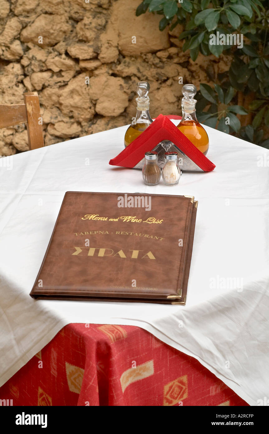 Menu opened on restaurant table Stock Photo - Alamy