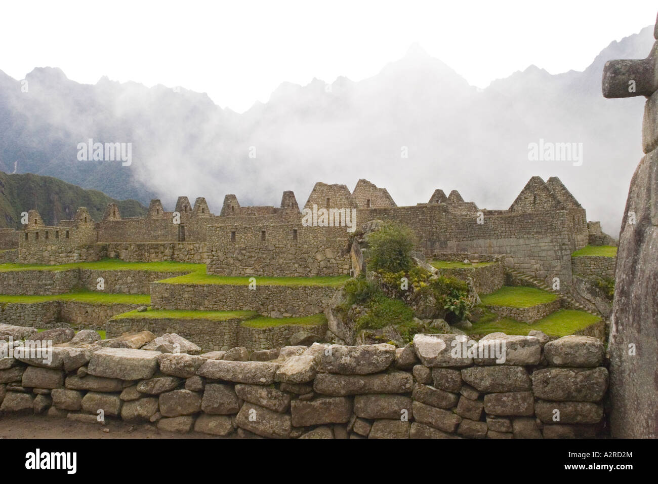 Misty view of Machu Picchu ruins Peru Stock Photo - Alamy