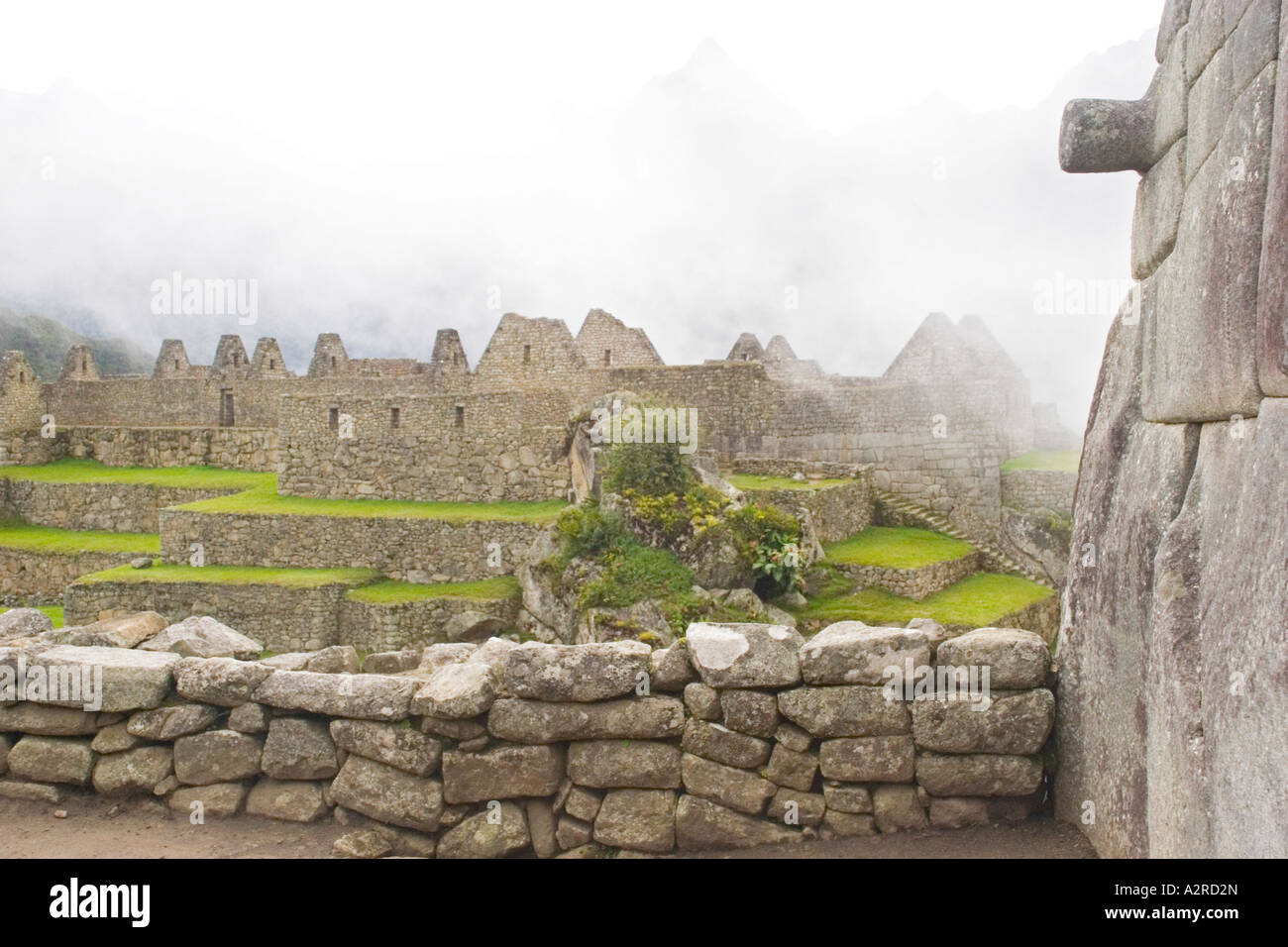Misty view of Machu Picchu ruins Peru Stock Photo - Alamy