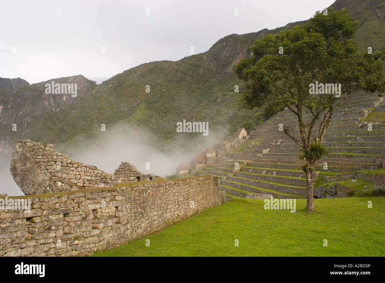 Misty view of Machu Picchu ruins Peru Stock Photo - Alamy
