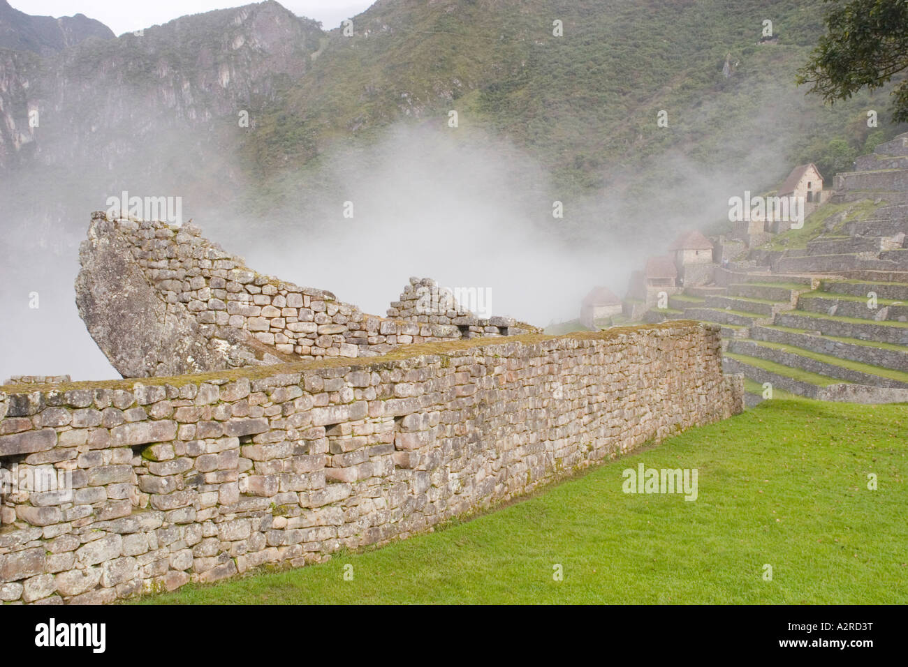 Misty view of Machu Picchu ruins Peru Stock Photo - Alamy