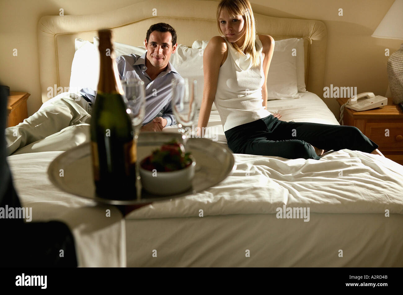 Couple receiving room service Stock Photo - Alamy