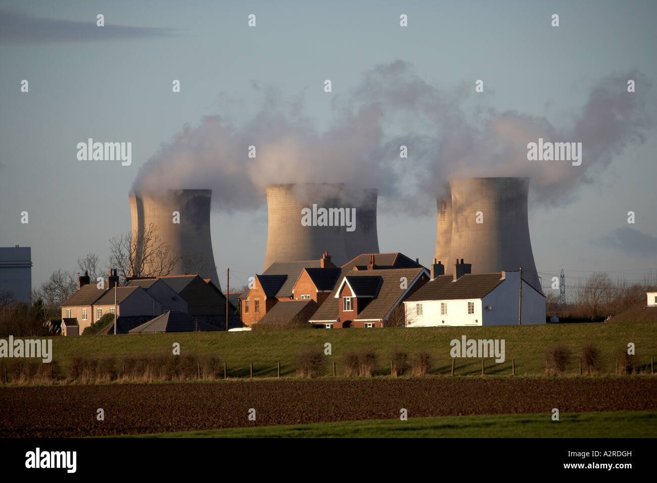 Drax Power Station tower above local houses North Yorkshire England UK ...