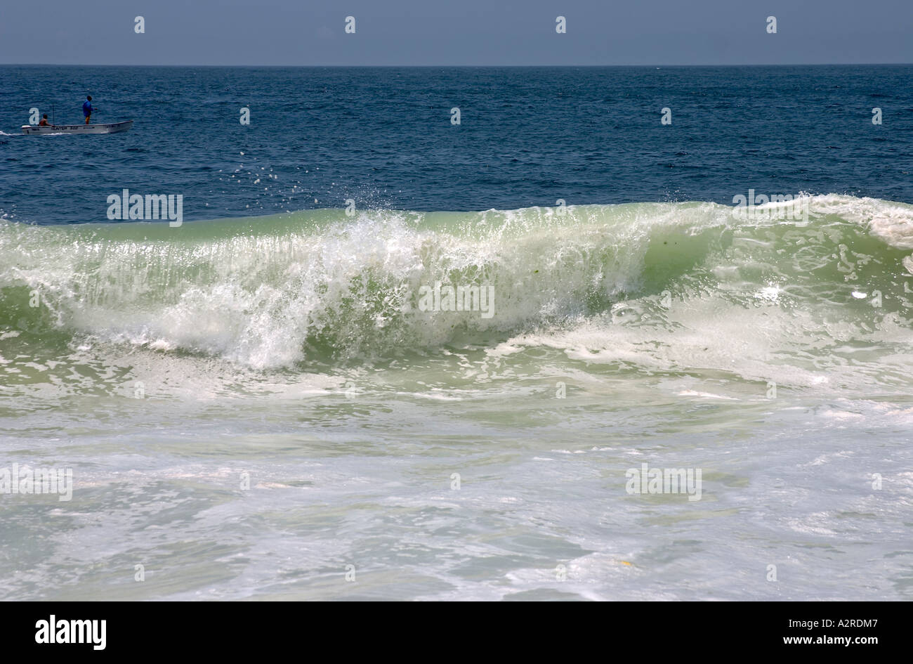 Rolling breaking wave with surf and foam Copacabana beach Rio de ...