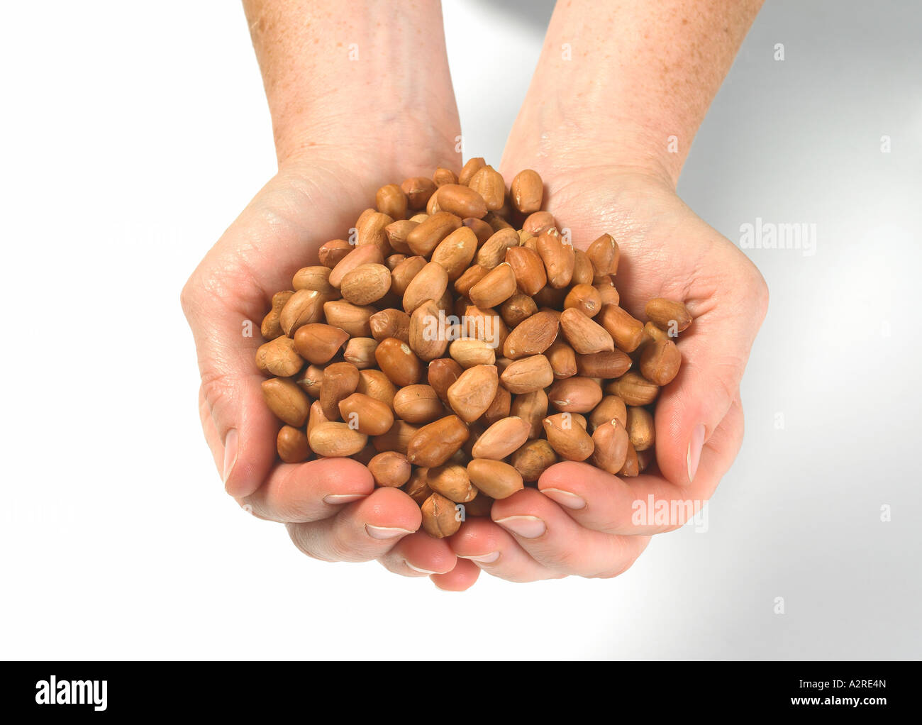 Handfull peanuts hi-res stock photography and images - Alamy