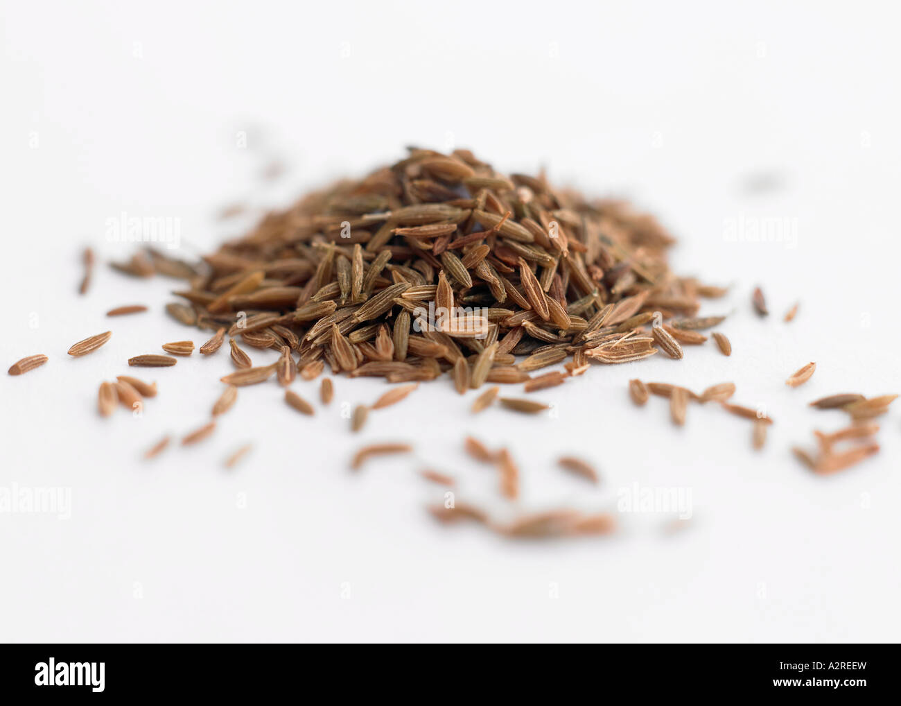 small pile of cumin seeds Stock Photo - Alamy