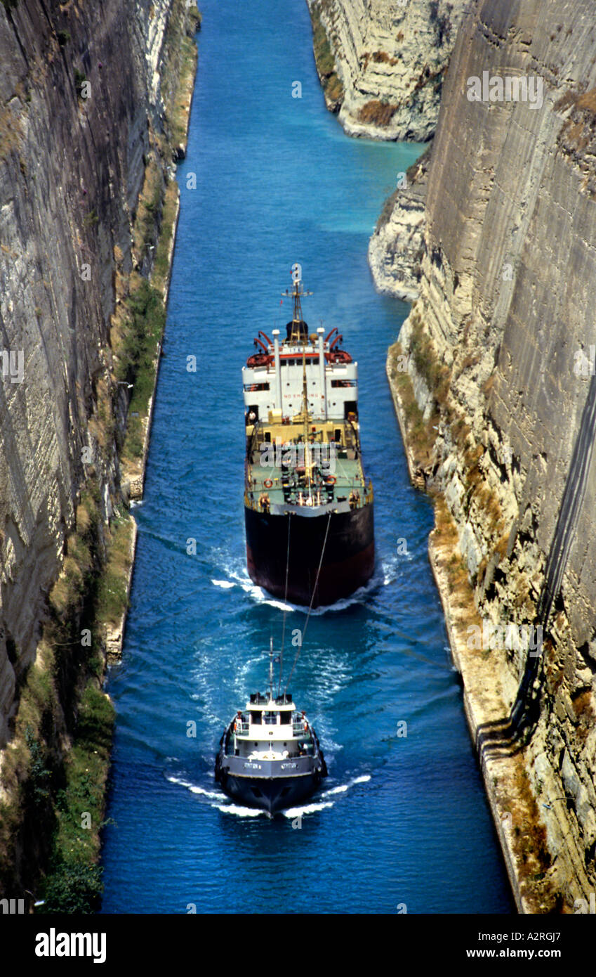 Tug leading container ship through Corinth Canal in Greece Stock Photo ...