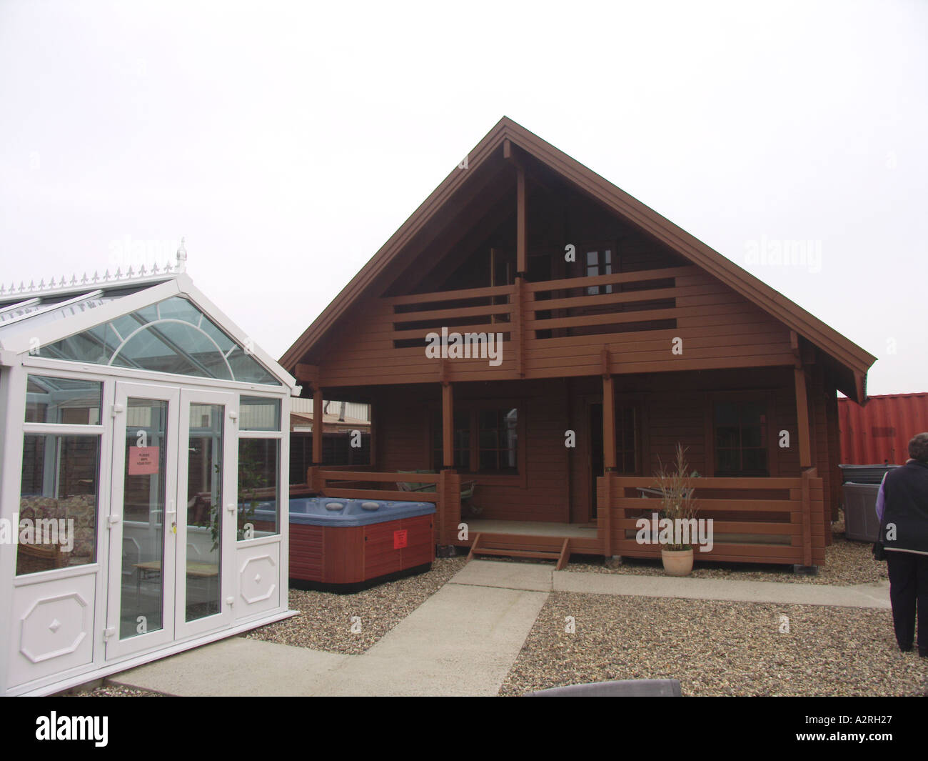 Timber cabins sheds on display in outdoor shop sales area Stock Photo ...