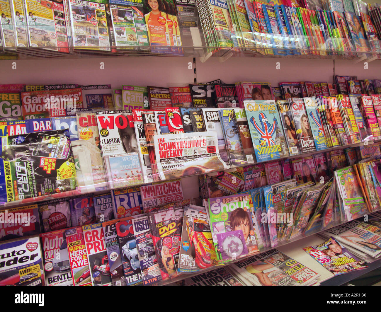 Magazine rack in newsagent shop Stock Photo: 3454255 - Alamy