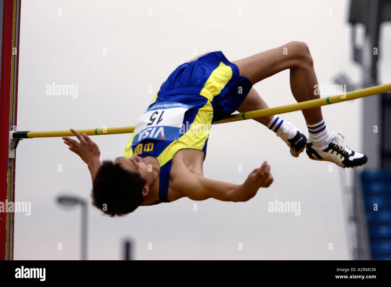 Qiu Hong Wang of China competes in the men s F46 High Jump competition ...