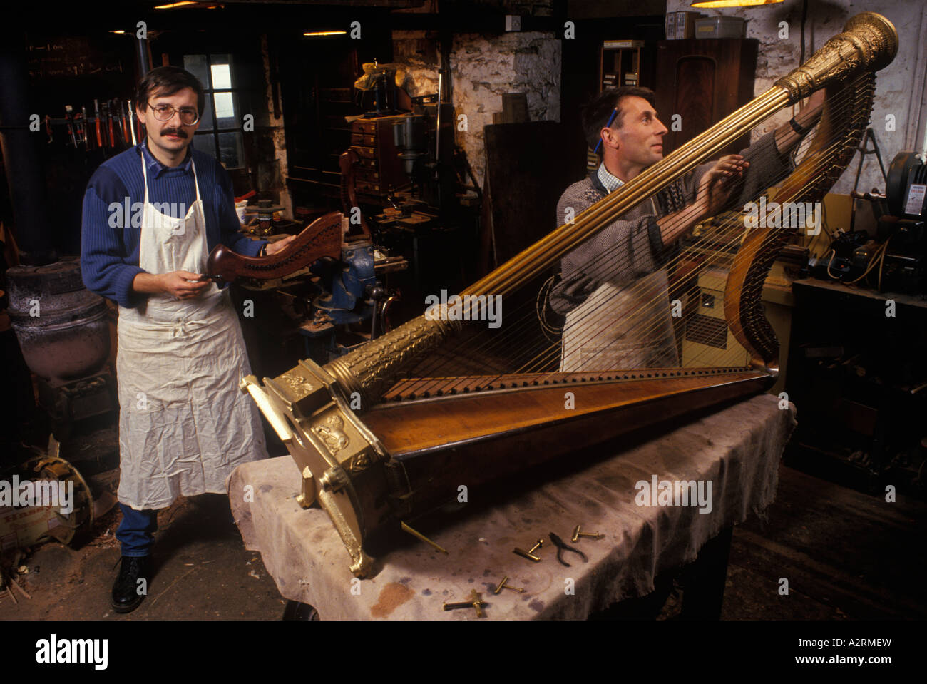 Welsh harp maker Alun Thomas in his workshop rural Pembrokeshire Wales ...