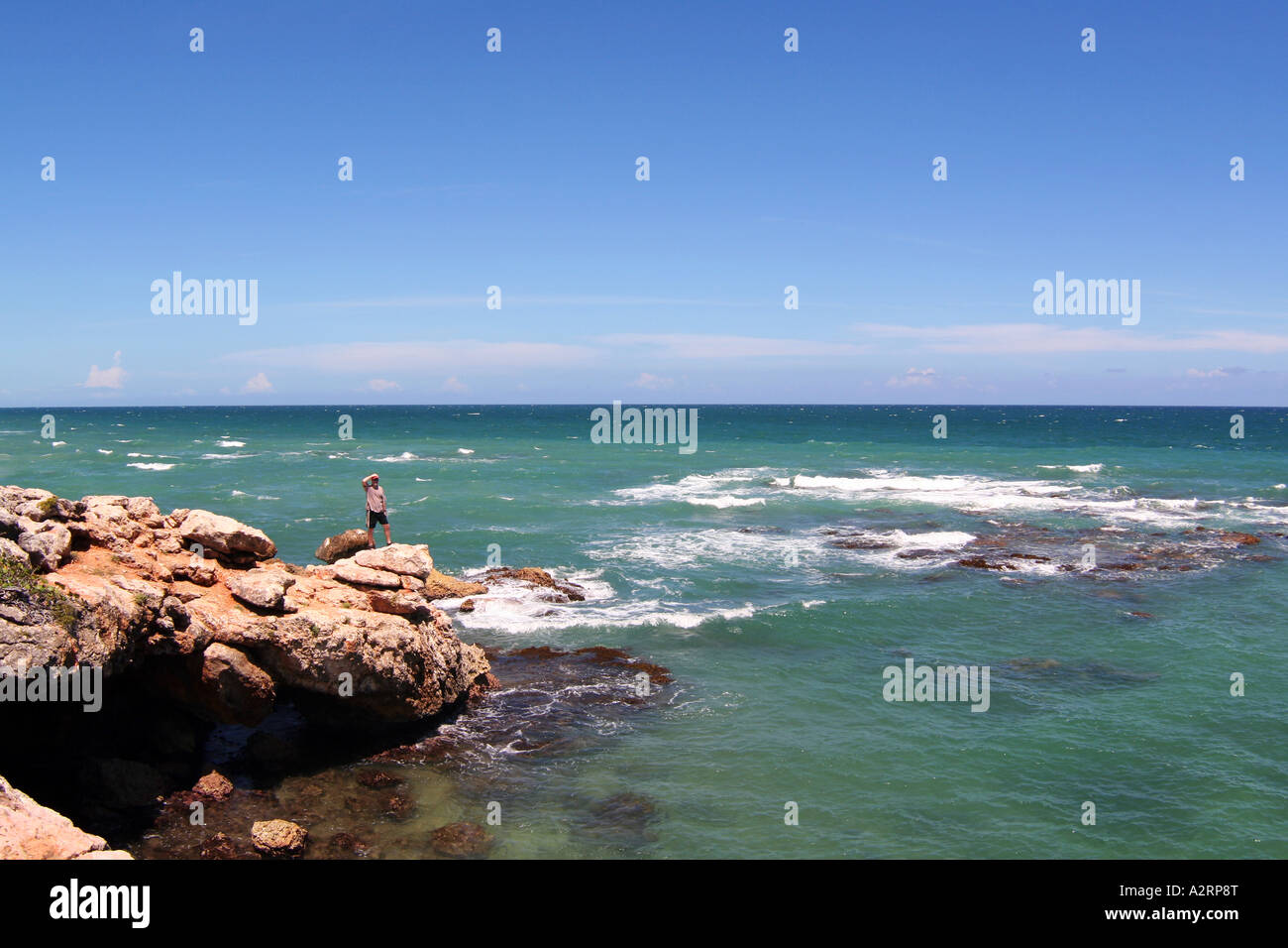 Man Overlooking the Ocean Stock Photo - Alamy