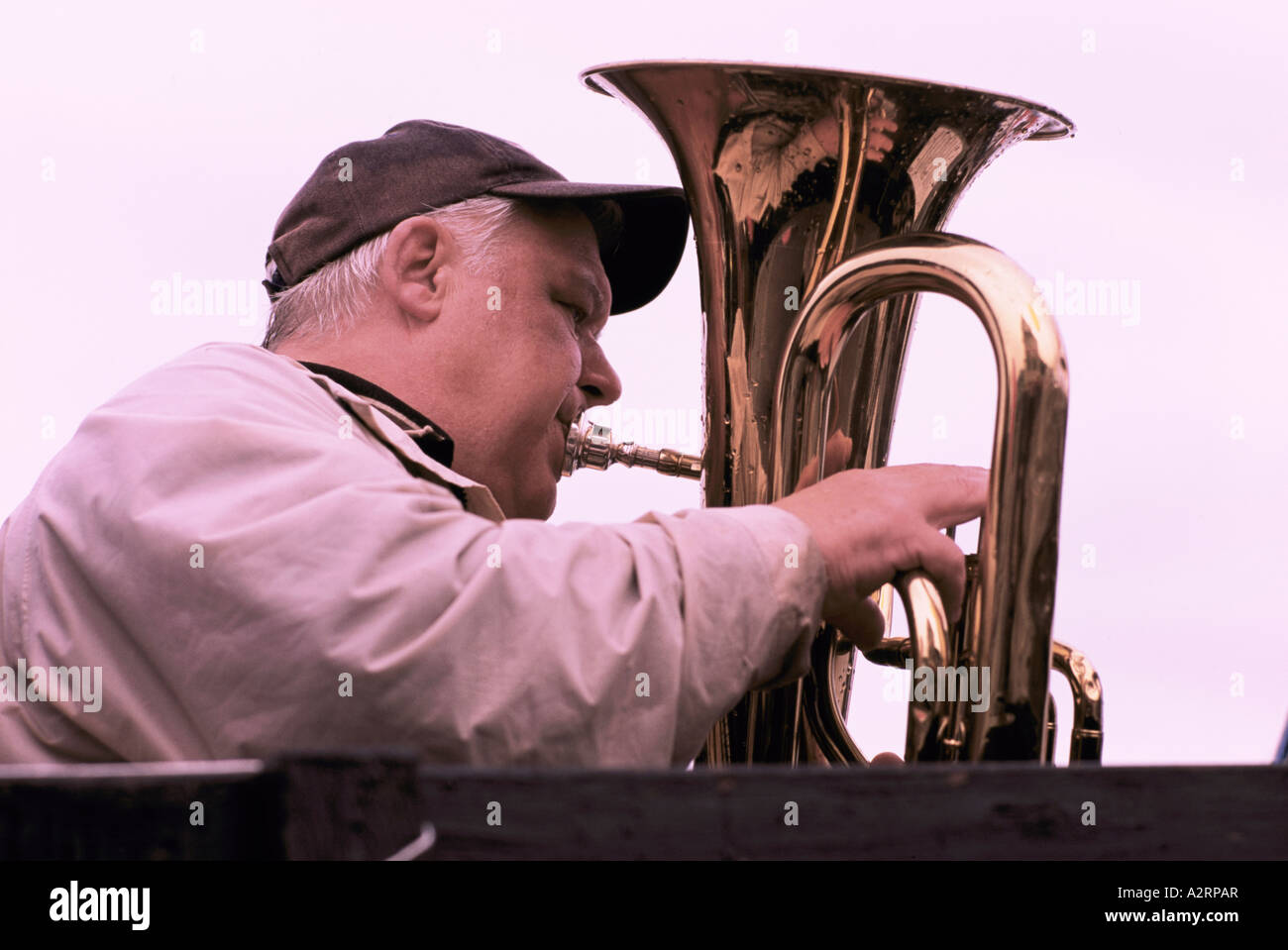 A Middle Aged Man playing a Tuba Stock Photo - Alamy