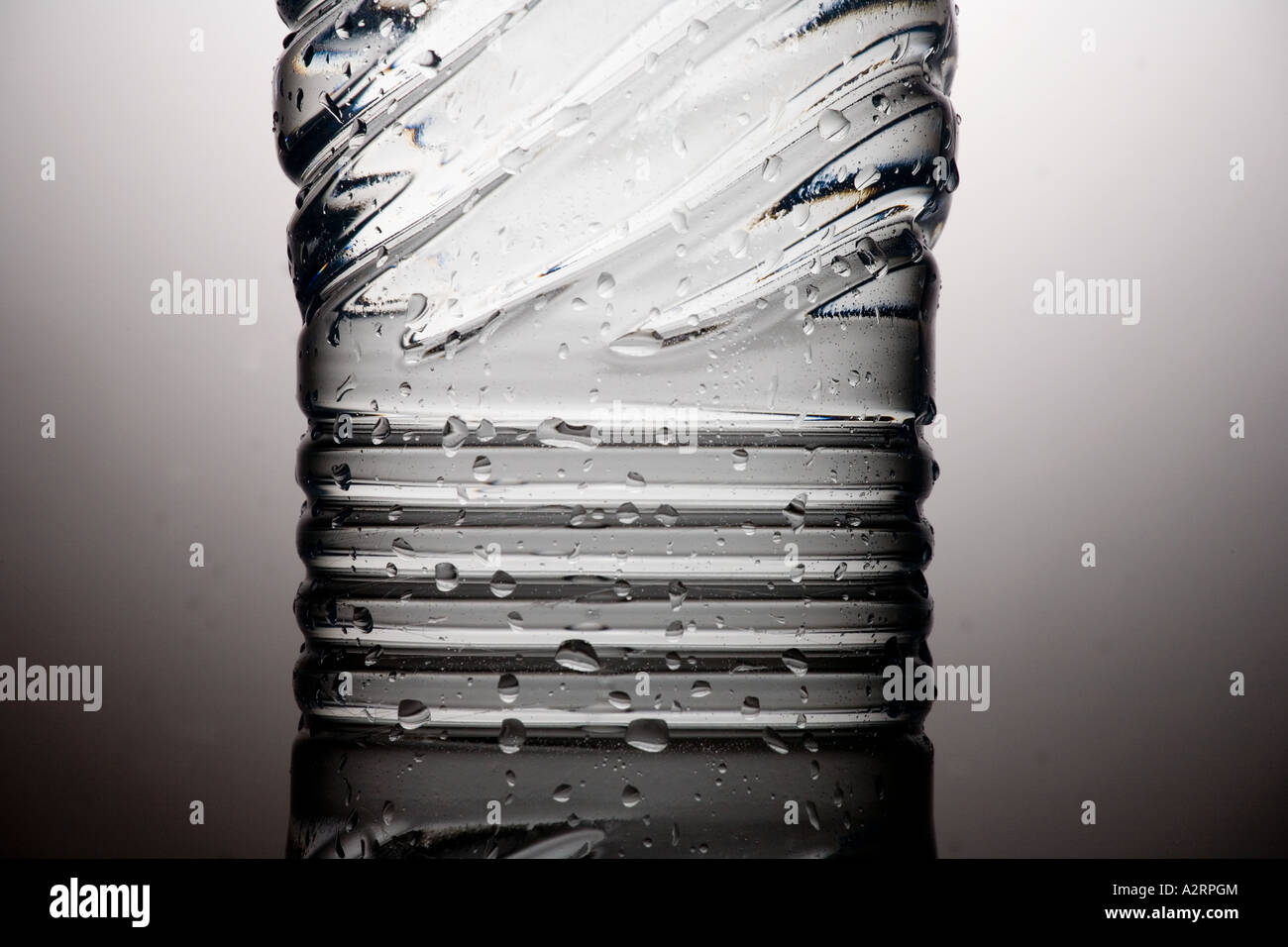 transparent bottle of cold water with little drops Stock Photo - Alamy