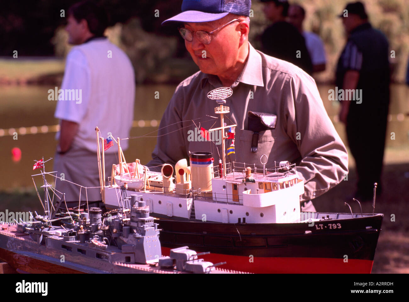 Senior Asian Man with Remote-controlled Model Boats as a Hobby in Spare ...
