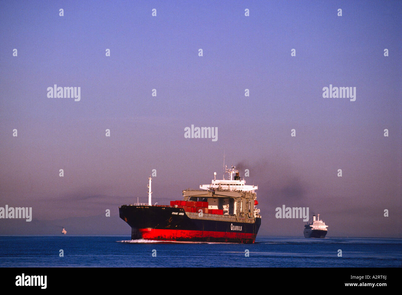 Freighter and Cruise Ships in English Bay approaching the City of ...