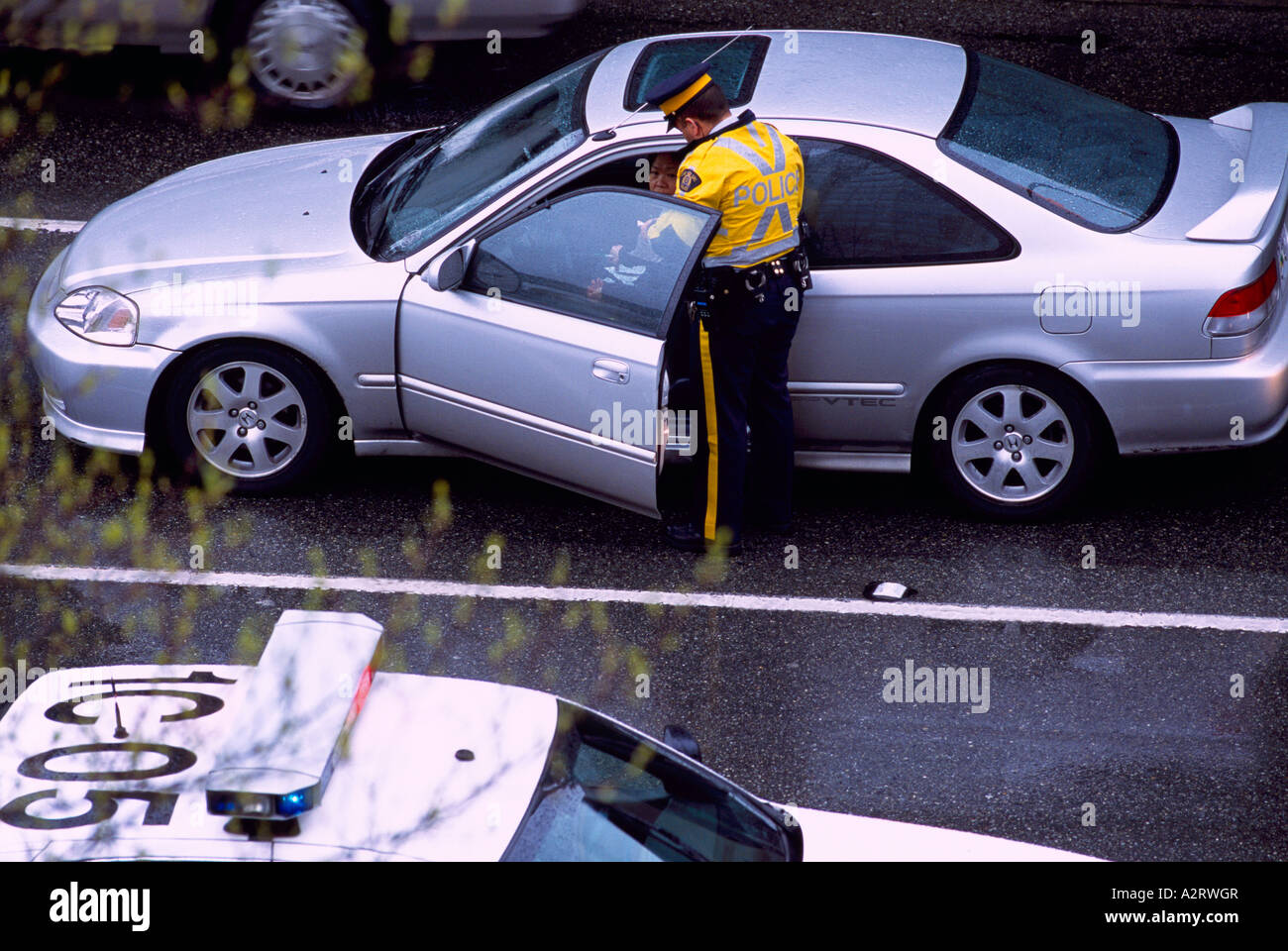 Police Officer writing a Ticket for Traffic Violation Incident to ...