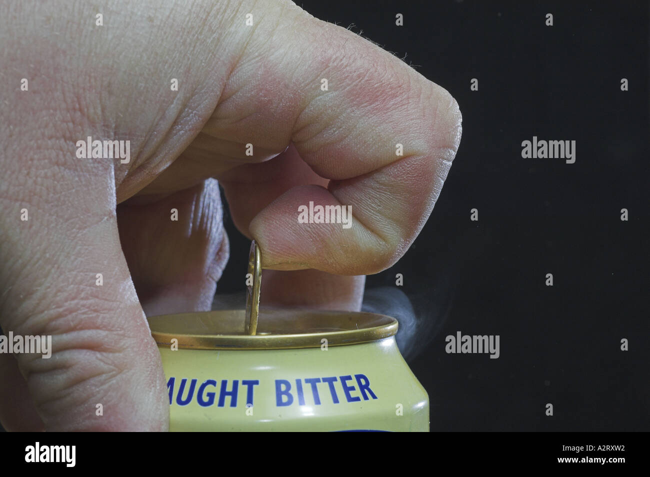 Pulling ring pull on beer can showing escaping gas Stock Photo - Alamy
