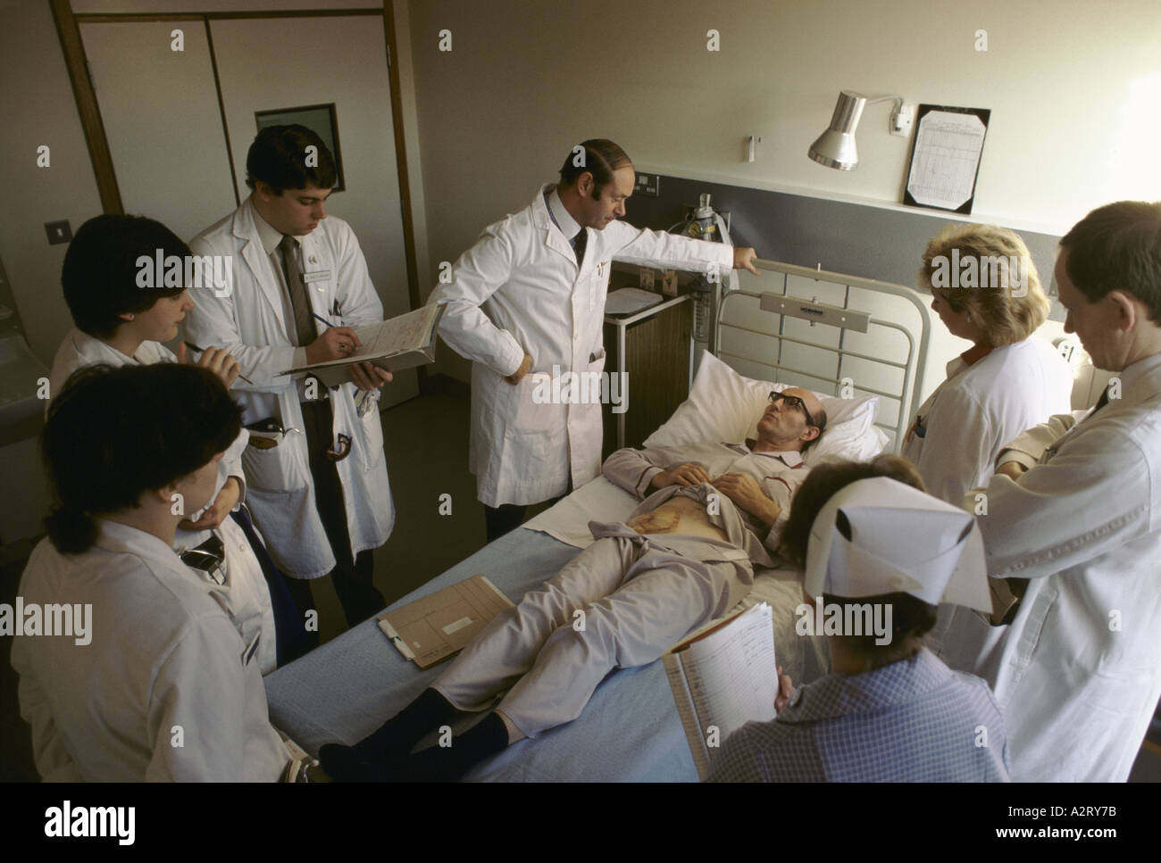 doctors on ward round Stock Photo - Alamy