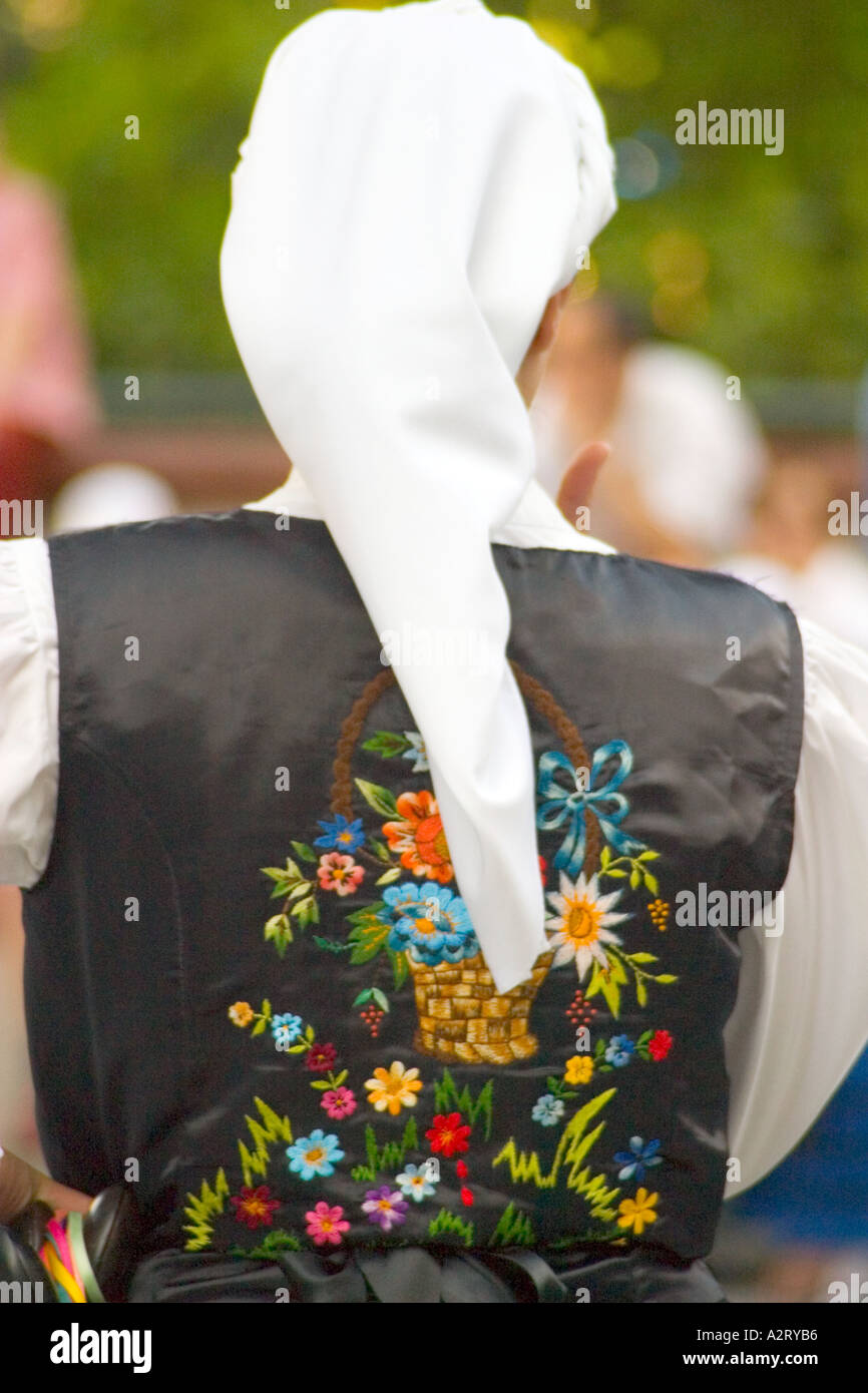 Asturian dancer with traditional headscarf and vest Stock Photo - Alamy