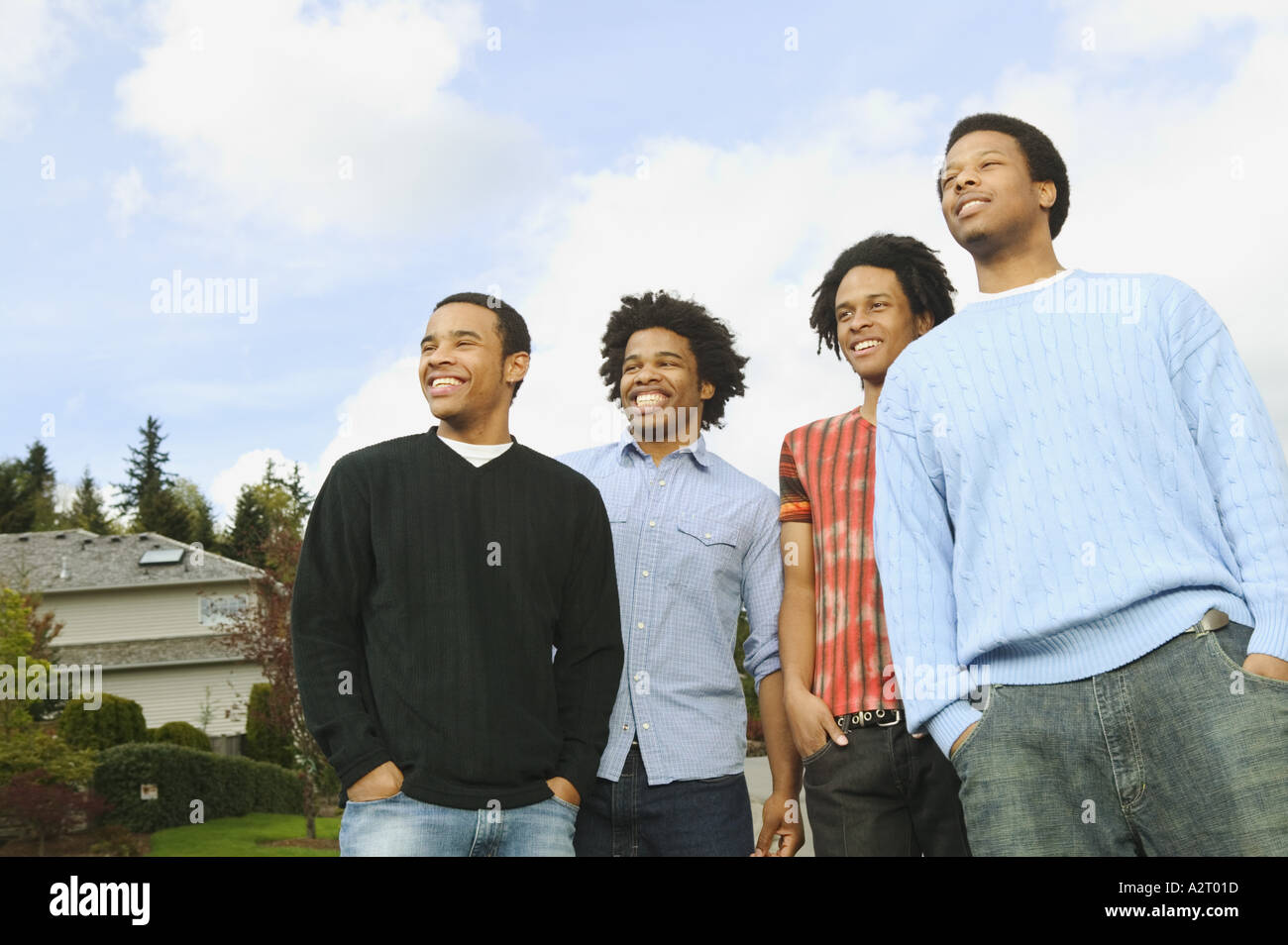 Four young men Stock Photo - Alamy