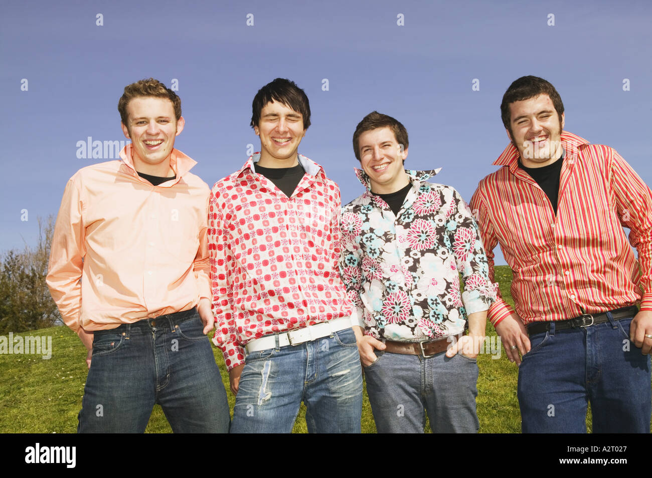Four young stylin men Stock Photo - Alamy