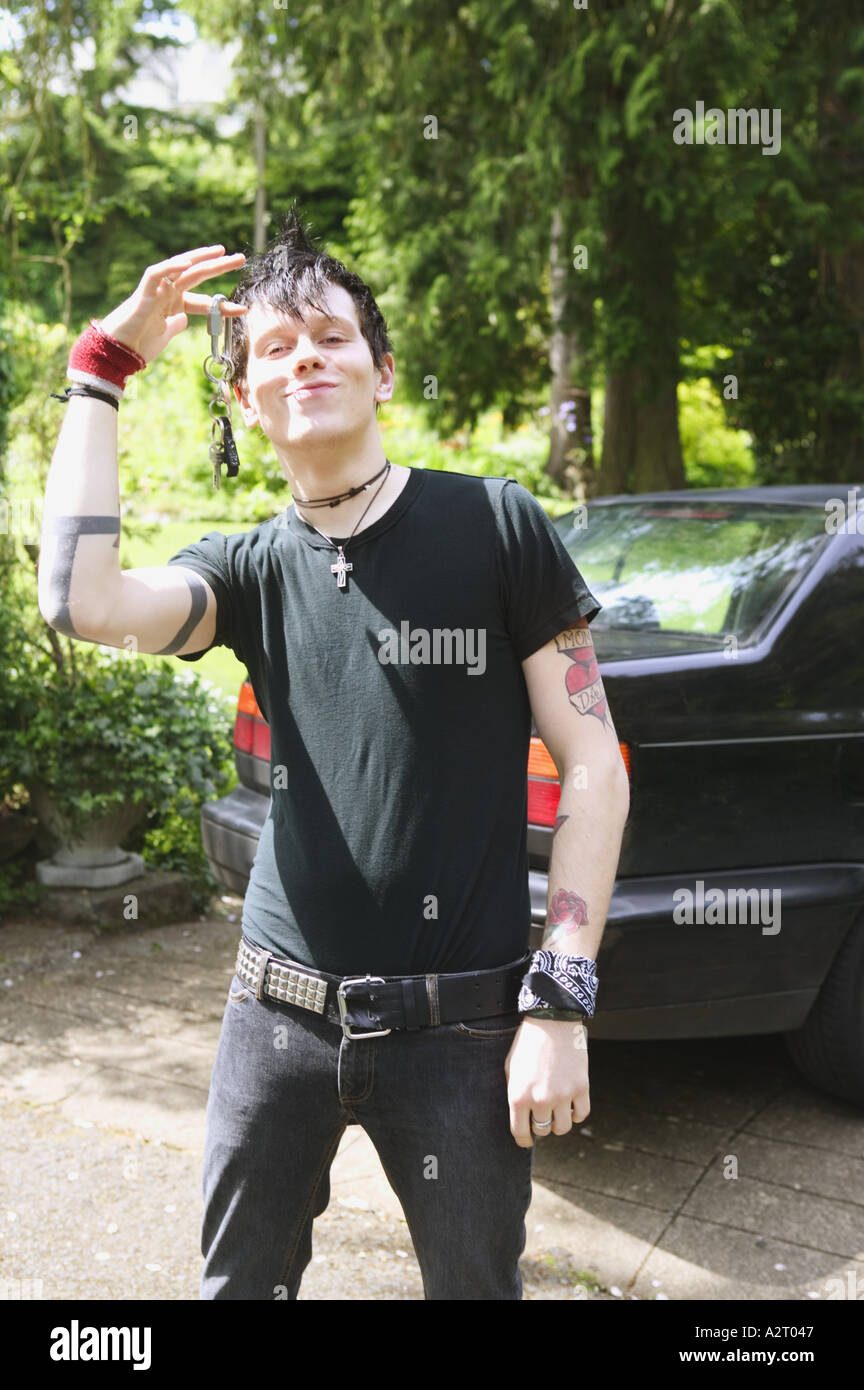 A punky male with car keys Stock Photo - Alamy