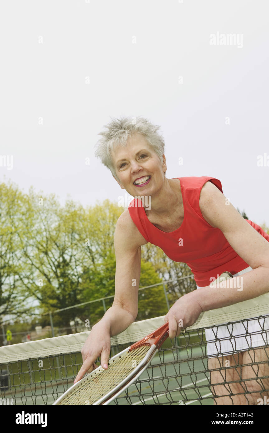 Middle aged person playing tennis hi-res stock photography and images ...