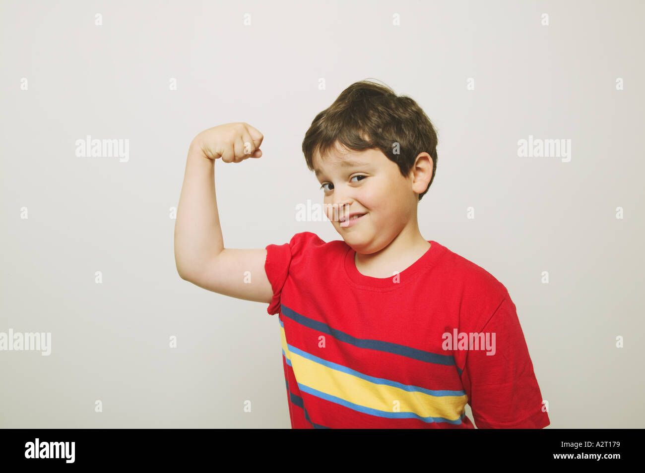 Kids flexing muscle hi-res stock photography and images - Alamy