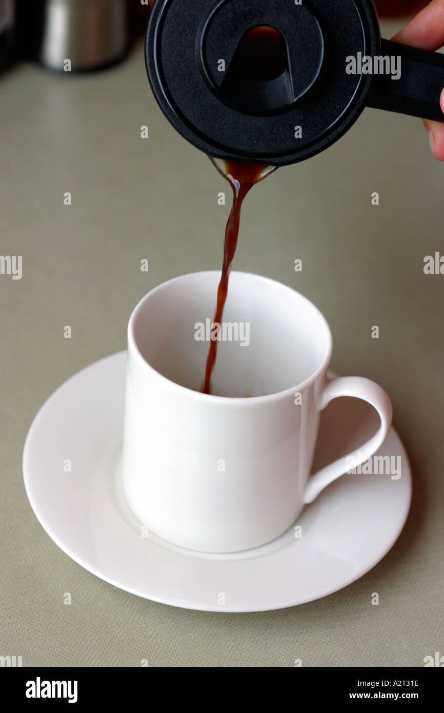 Pouring coffee in kitchen hi-res stock photography and images - Alamy