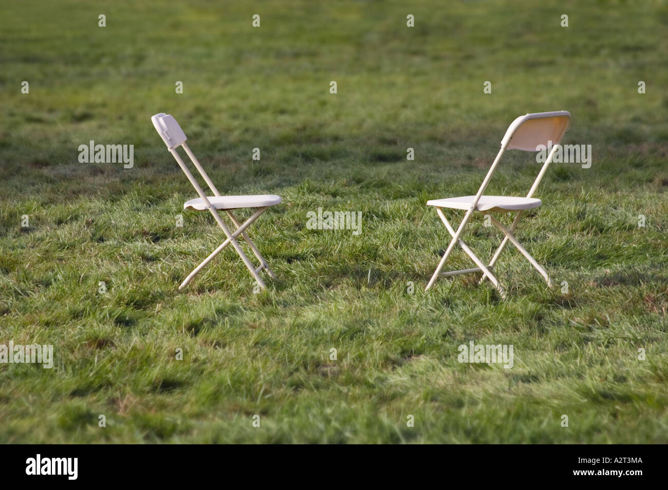 Two empty folding chair on hi-res stock photography and images - Alamy